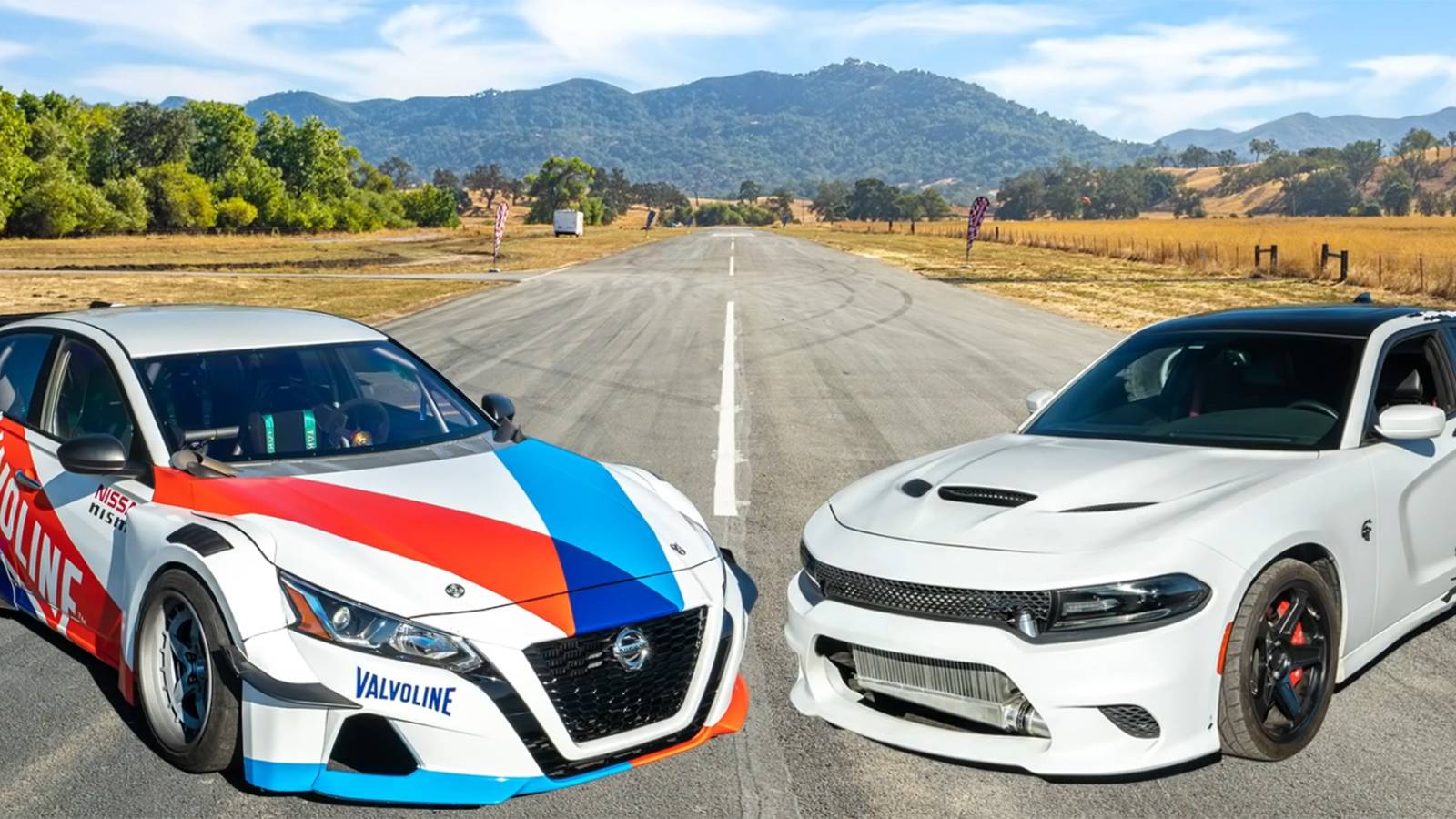 1,000-HP Charger Hellcat Takes On 1,300-HP Altima In Hoonigan Drag Race