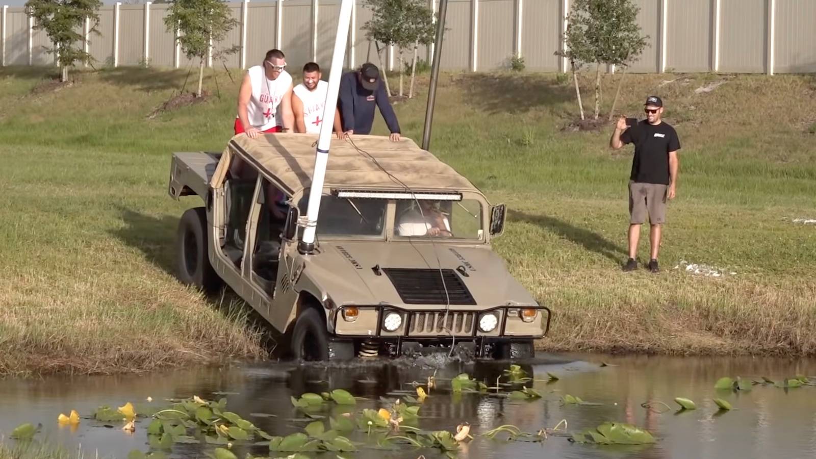 Watch This Humvee Go Completely Underwater Attempting 12-Foot-Deep Pond ...