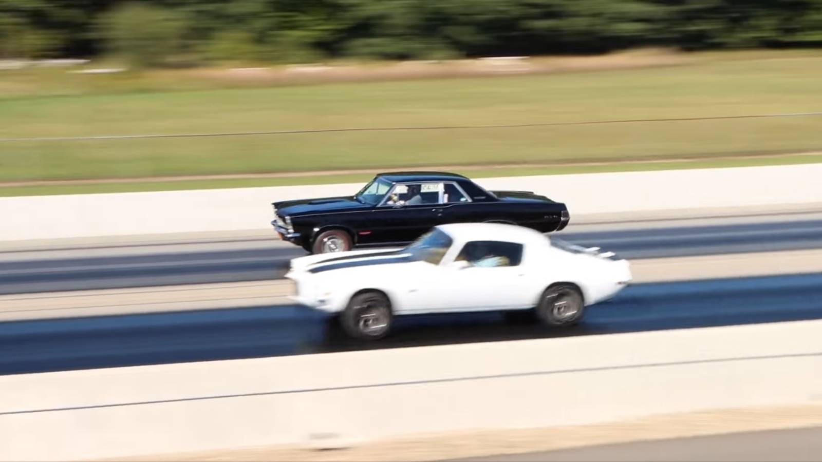 The Ultimate Drag Race: 1970 Chevrolet Z28 Camaro Vs 1965 Pontiac GTO