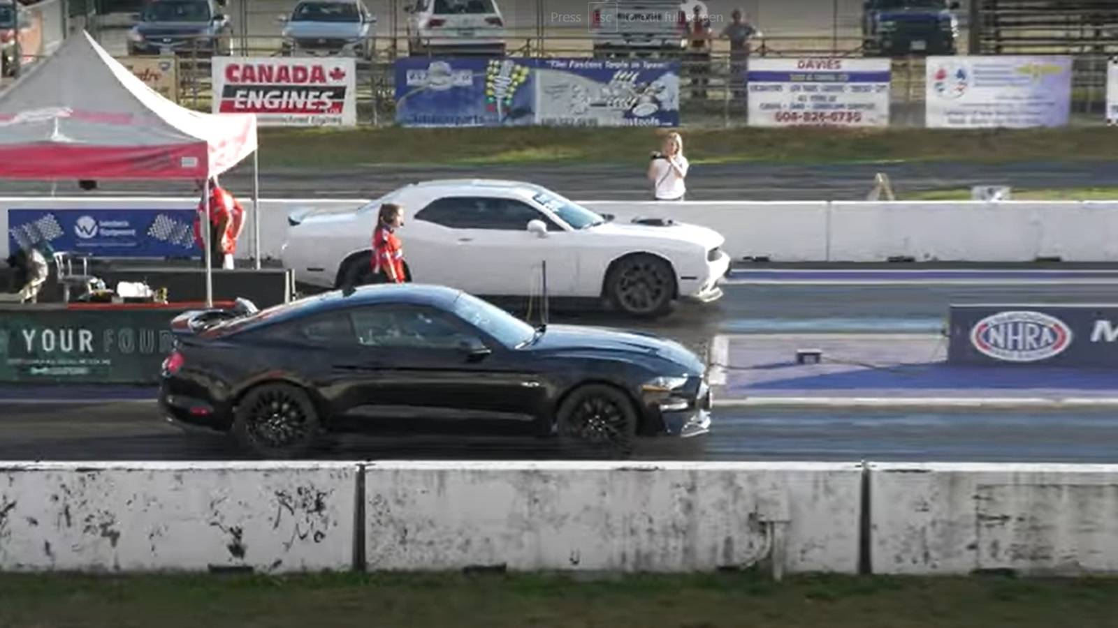 A Ford Mustang GT Battles A Dodge Challenger Scat Pack For The Muscle ...