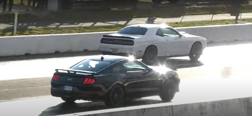 A Ford Mustang GT Battles A Dodge Challenger Scat Pack For The Muscle ...