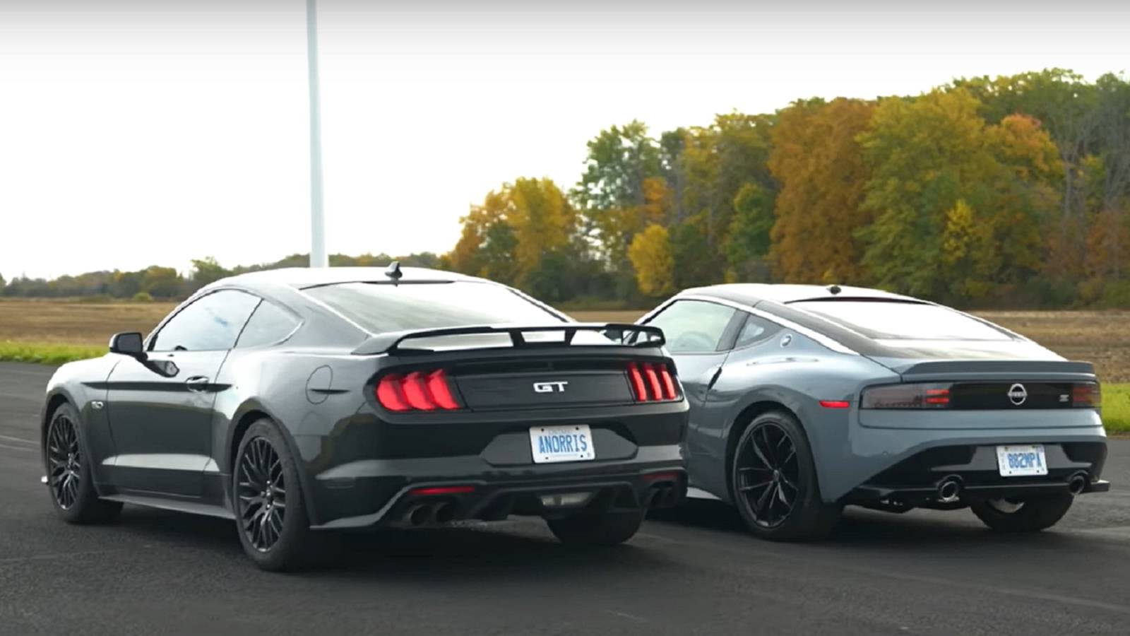 The New Nissan Z Tries To Keep Up With A New Ford Mustang GT
