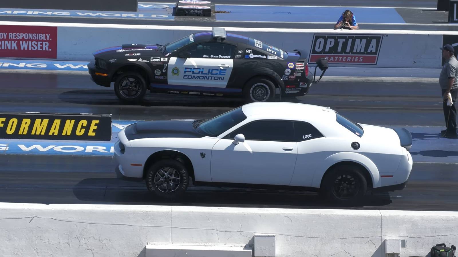 Watch: "Police Cars" Challenged To Drag Races By Local American Muscle Cars