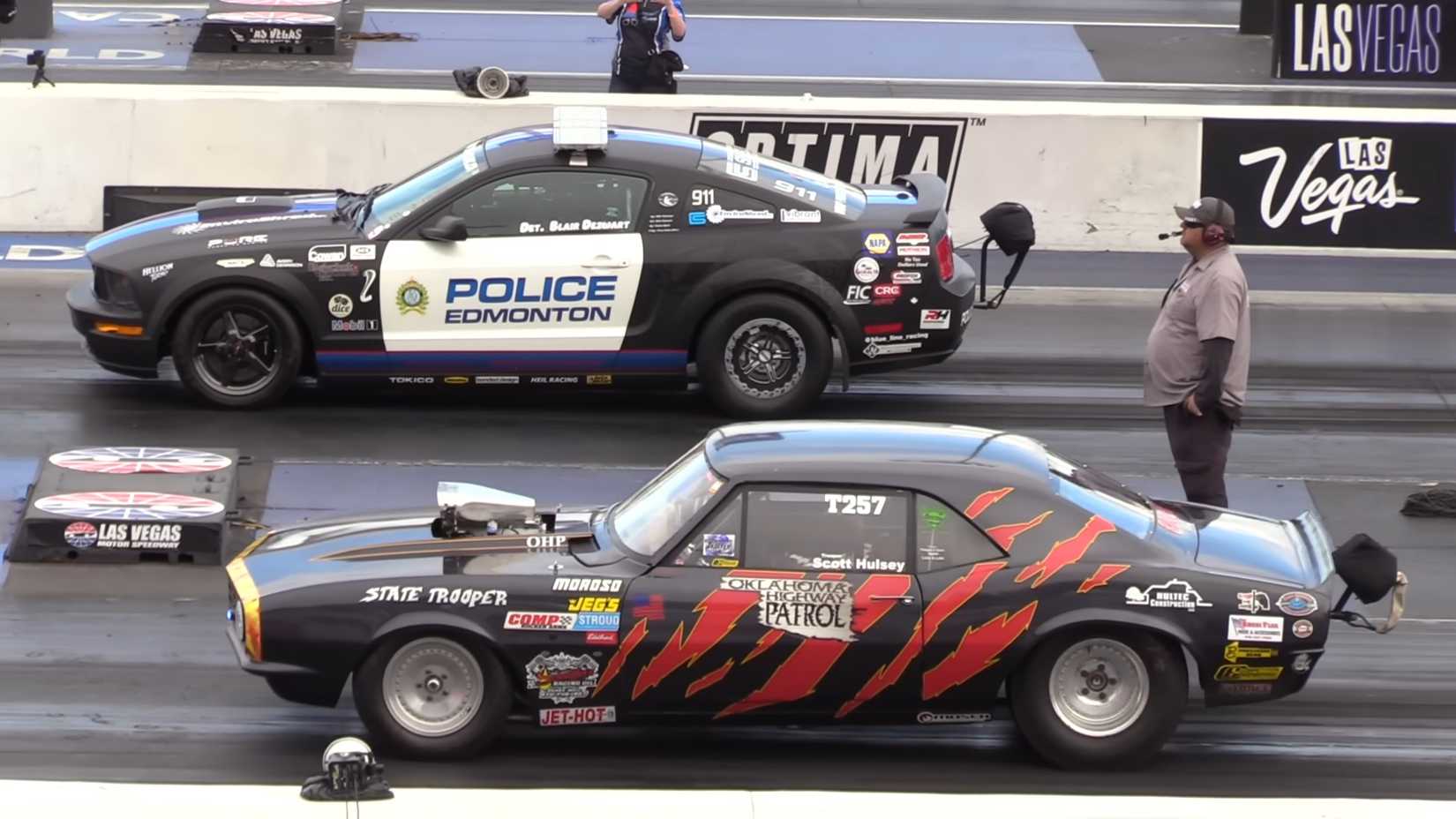 Watch: "Police Cars" Challenged To Drag Races By Local American Muscle Cars