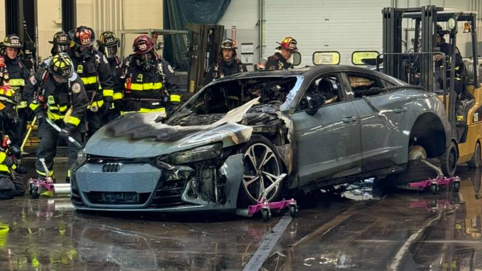 Audi E-tron Gt Catches Fire On Lift After Battery Recall Issues