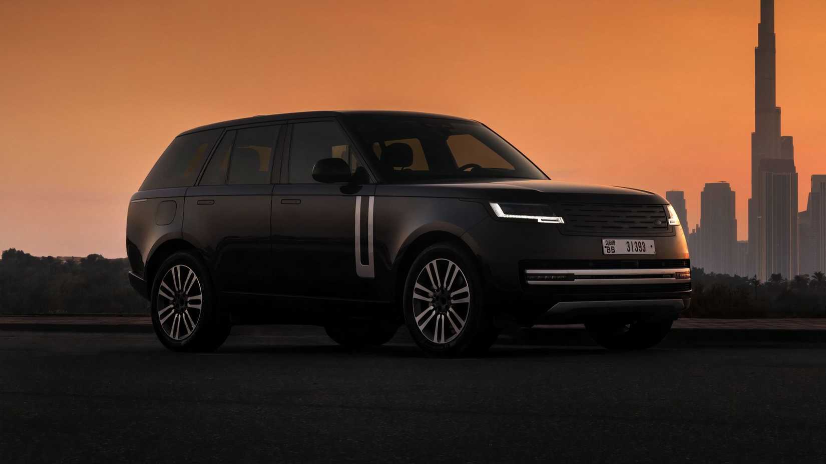 Land Rover Leaks Photos Of New Range Rover EV SUV Conquering The Sand ...