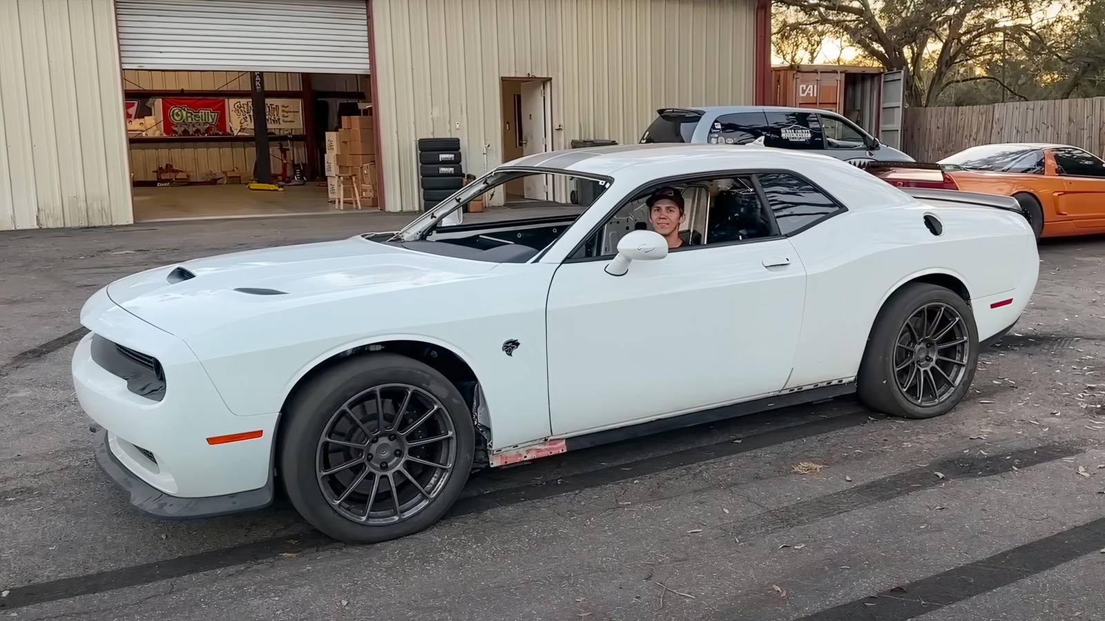 This YouTuber Swapped A Challenger Body Onto A Tesla Plaid Chassis