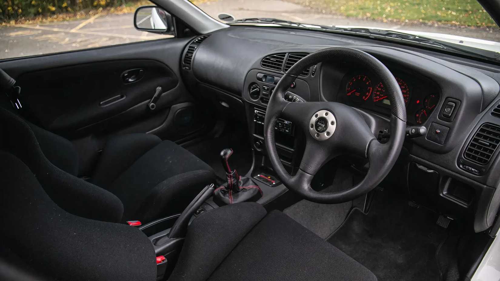 The Rarest Mitsubishi Evo Ever Is A Rally Car With License Plates