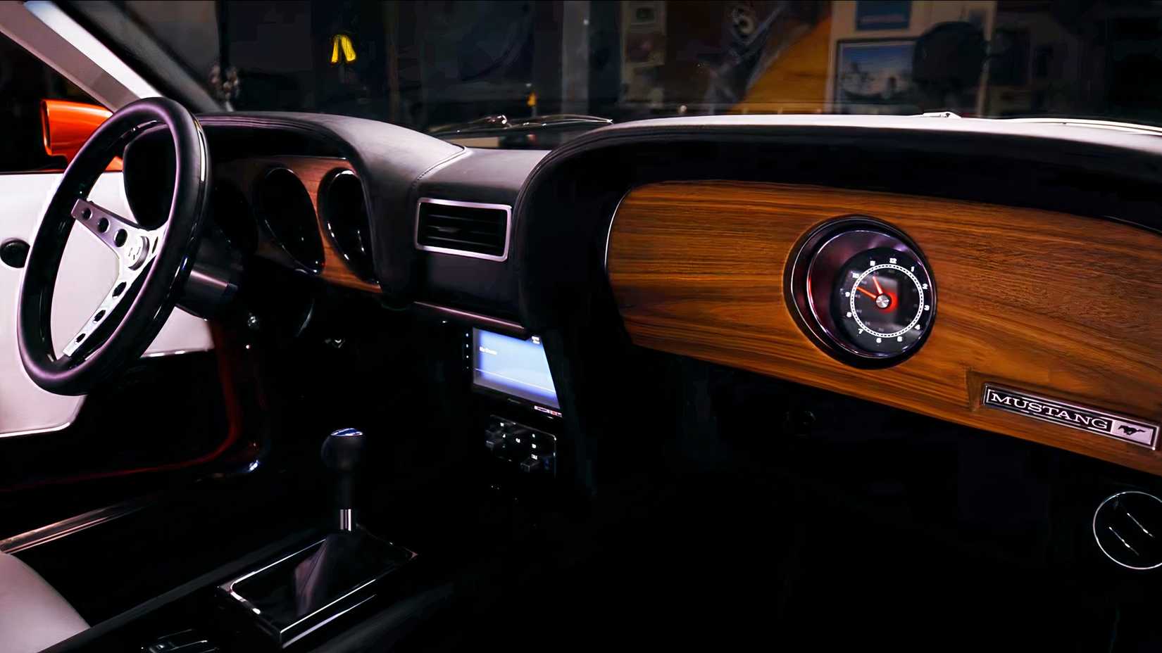 Jay Leno Reviews The Revology 1969 Mustang Boss 429