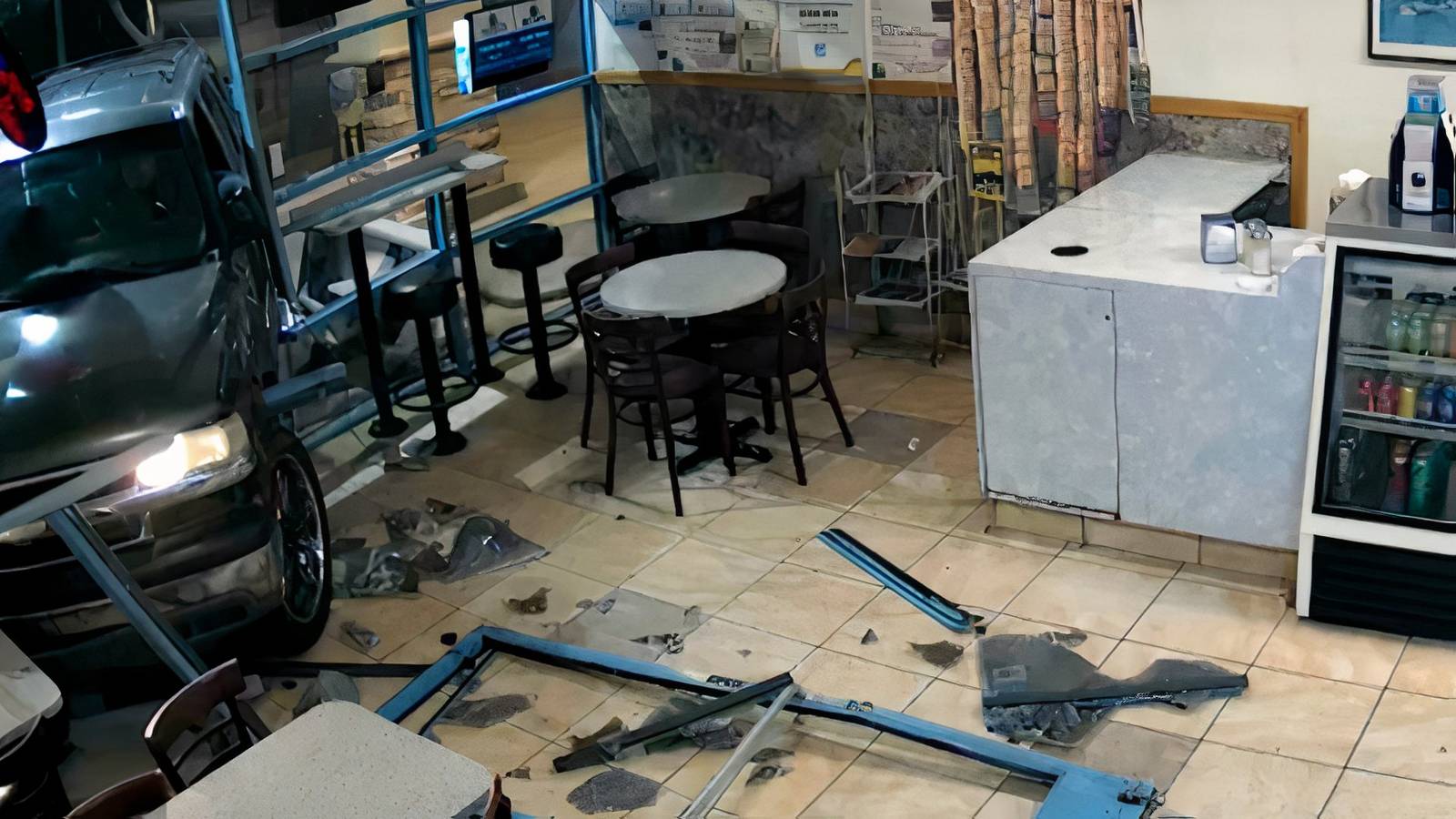 Chevy Tahoe Smashes Into A Donut Shop Before Starting A Police Chase